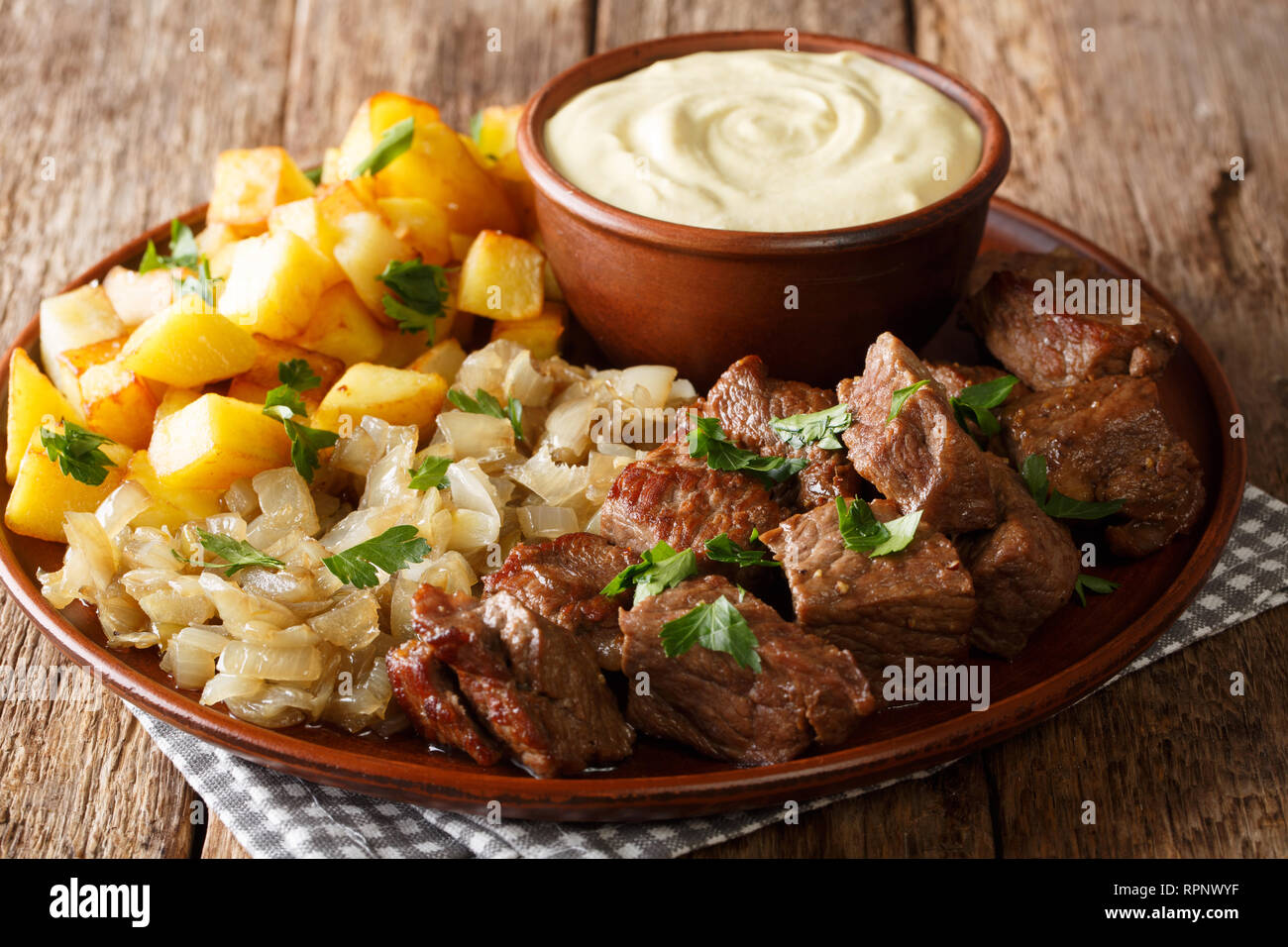 Beef Rydberg with crisp potatoes and beef tenderloin with onion ...