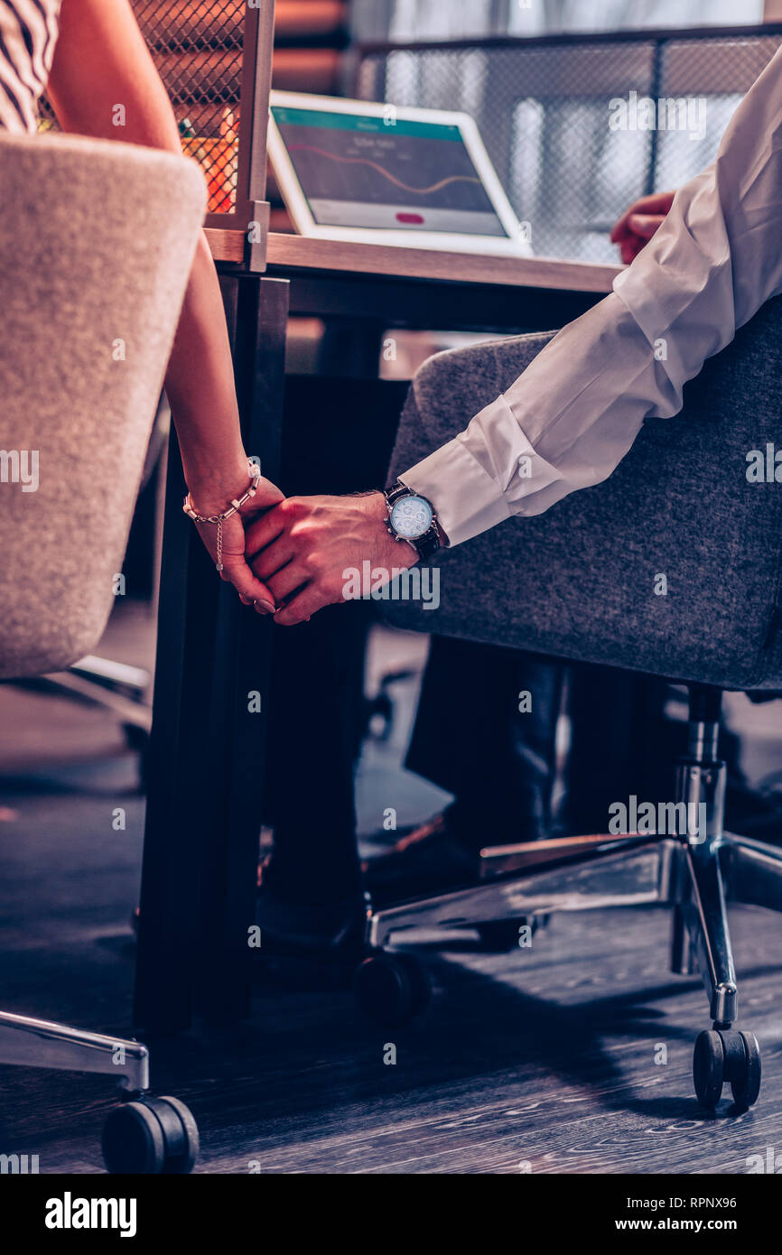 Focused photo on male hand that touching tender palm Stock Photo - Alamy