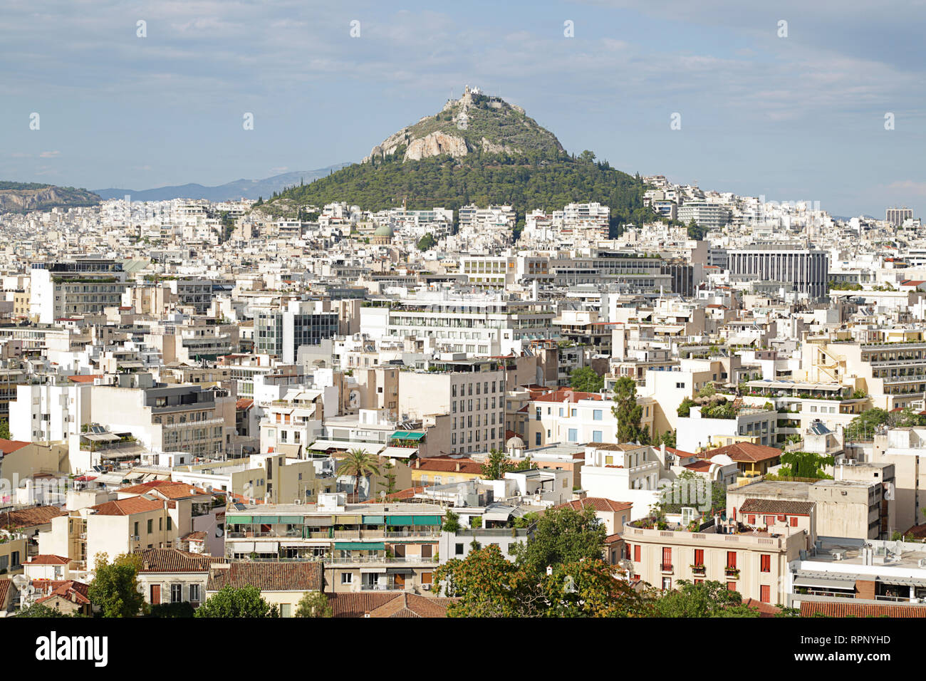 Panoramic view of mount Lycabettus and surrounding cityscape buildings ...