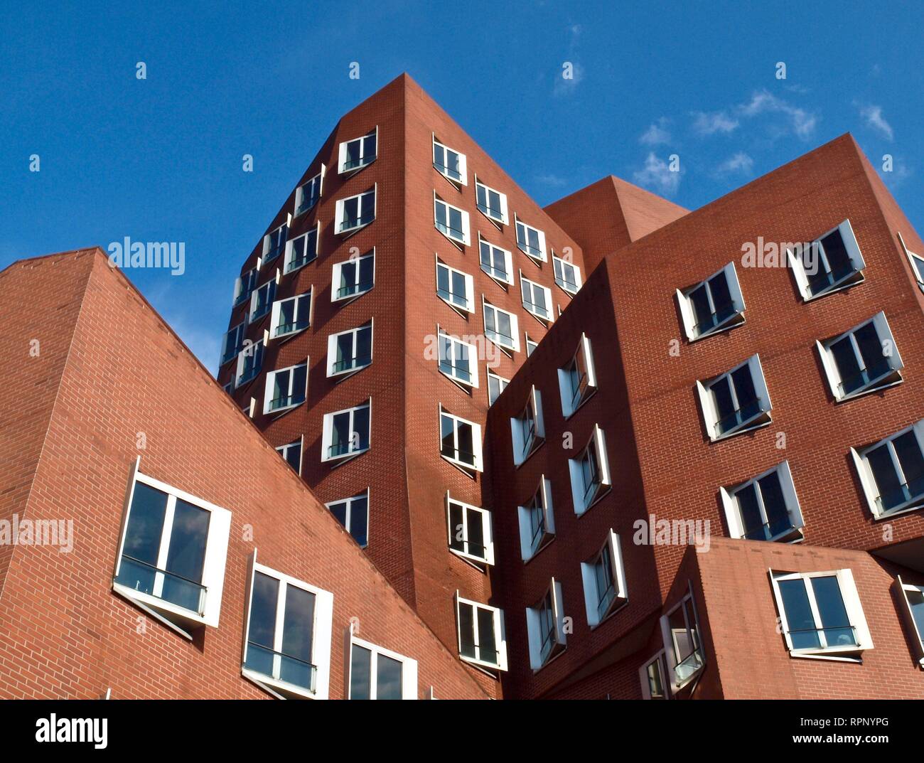Red Gehry building at the media harbor of Duesseldorf in Germany Stock ...