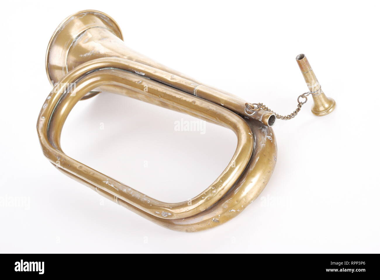 Antique brass trumpet on a white background Stock Photo - Alamy
