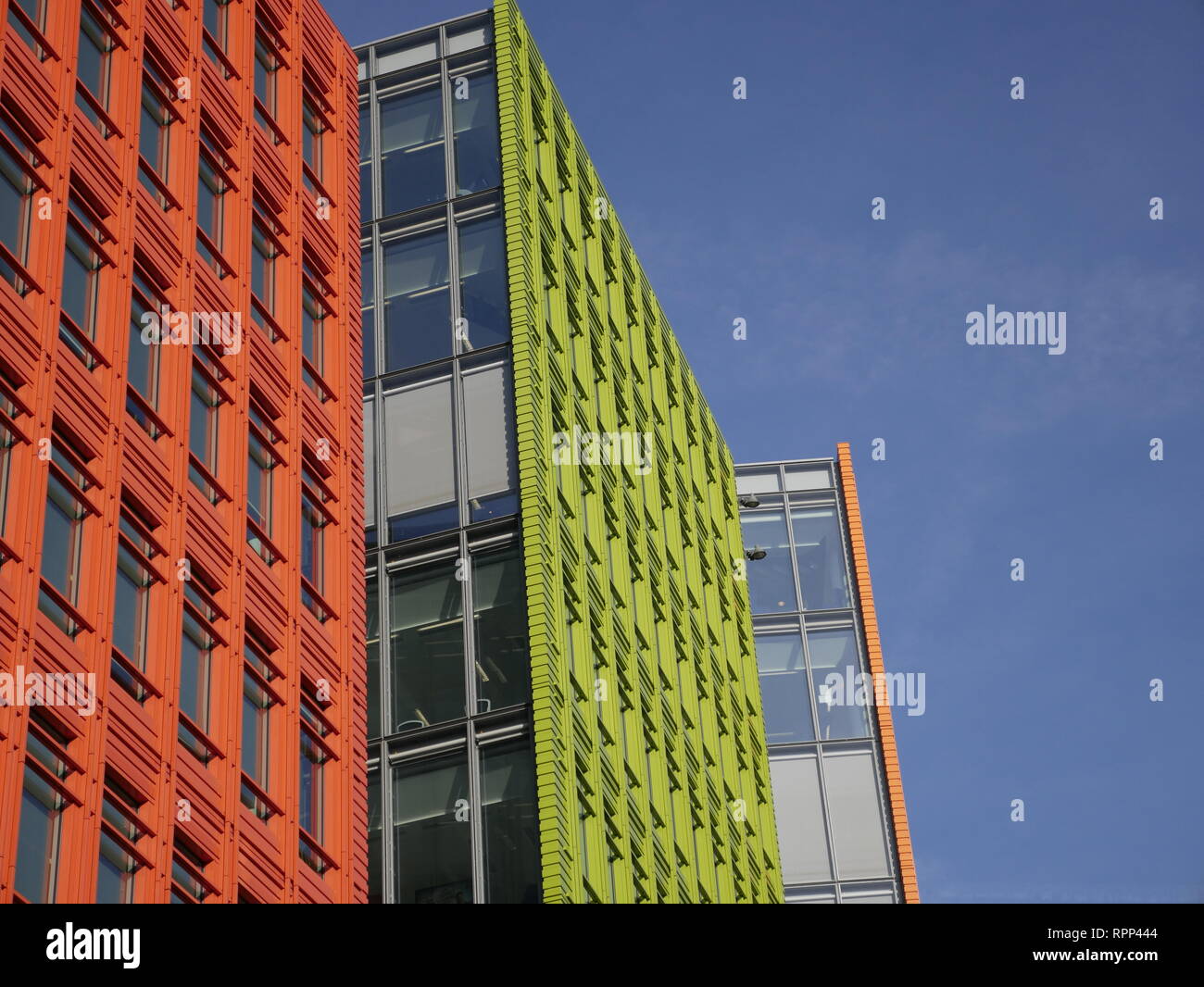 High rise coloured office buildings near central St Giles church ...