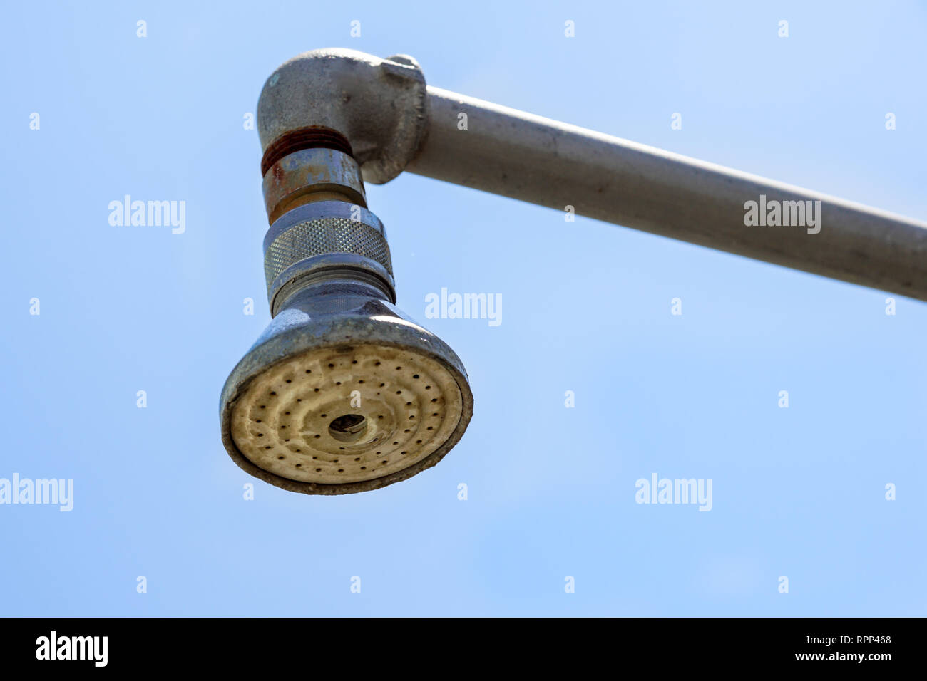 Hard water deposit and rust on shower tap Stock Photo - Alamy