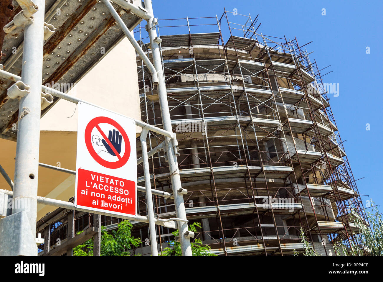 No entry sign on the fence in contruction site with house under ...