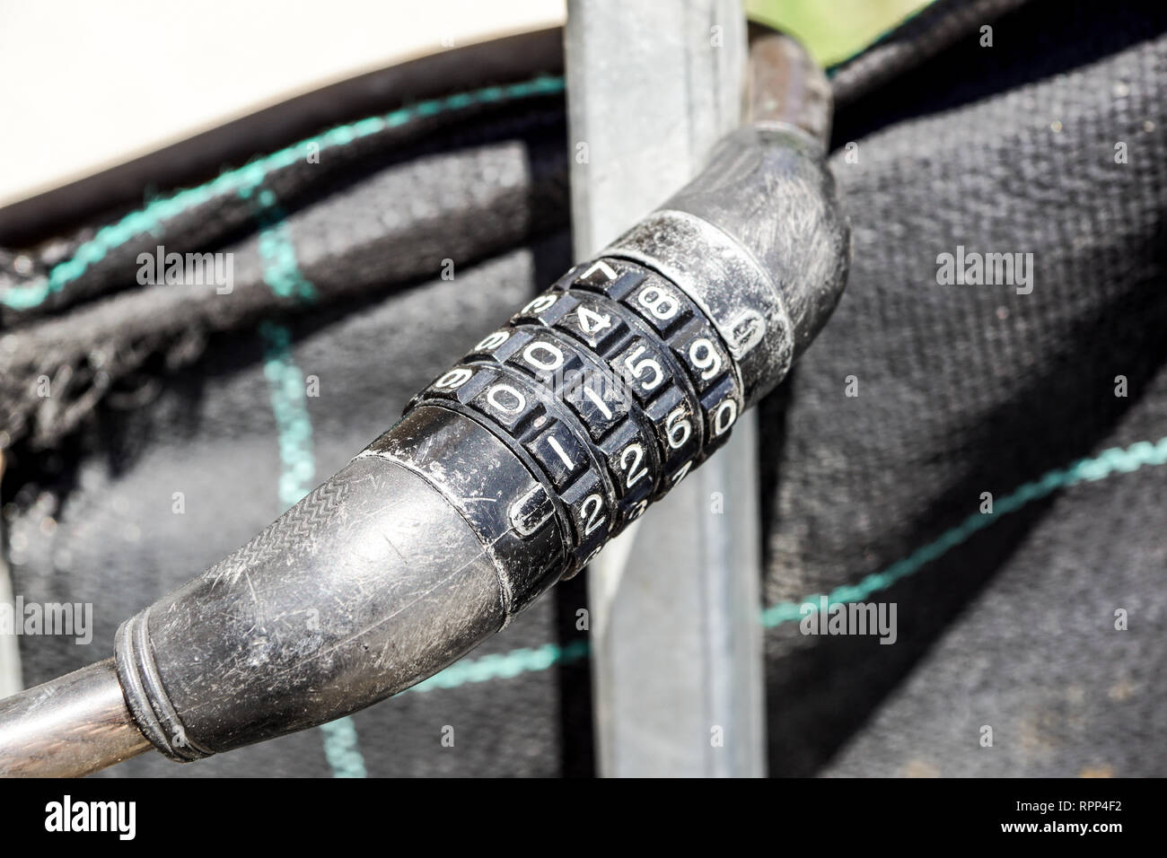 chain and padlock with number combination on blackboard Stock Photo - Alamy