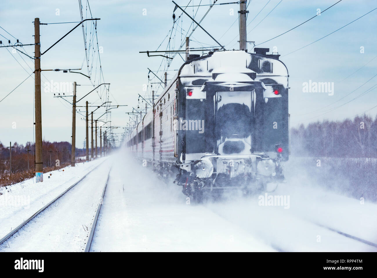 Passenger train moves Stock Photo - Alamy
