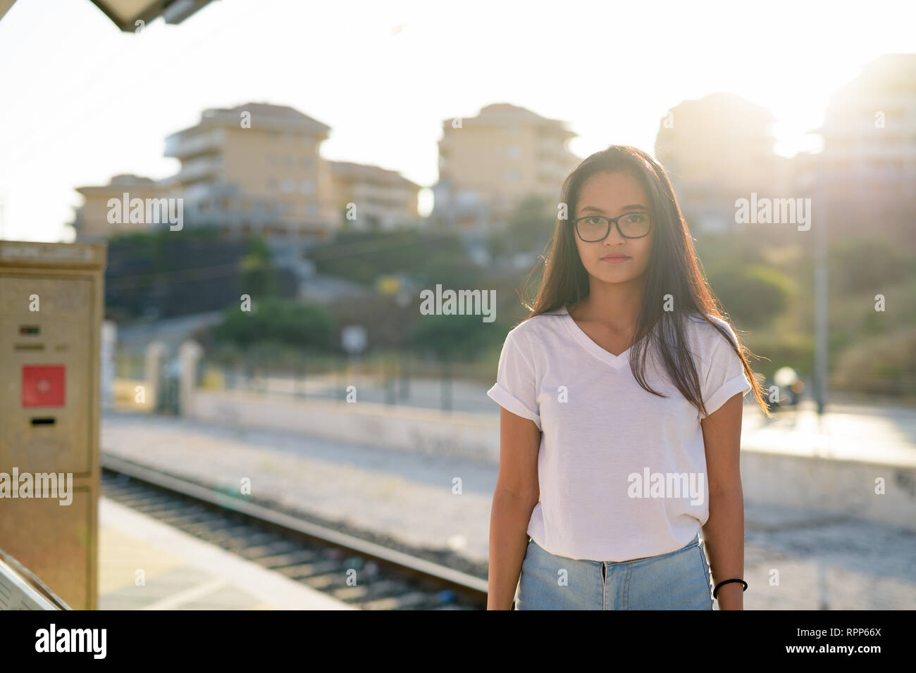 Young Beautiful Asian Tourist Woman At The Train Station Stock Photo ...