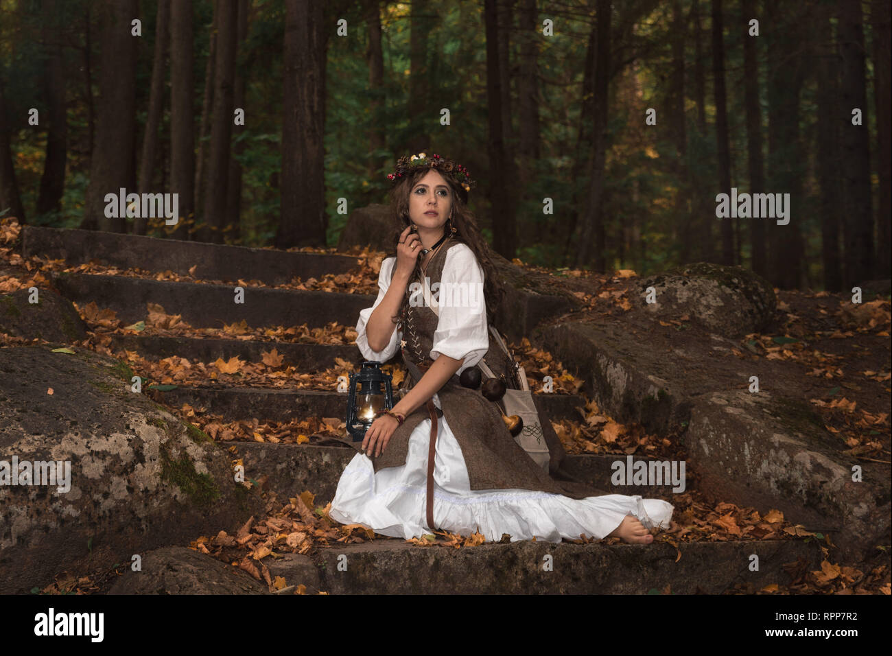 Young witch in the autumn hi-res stock photography and images - Alamy