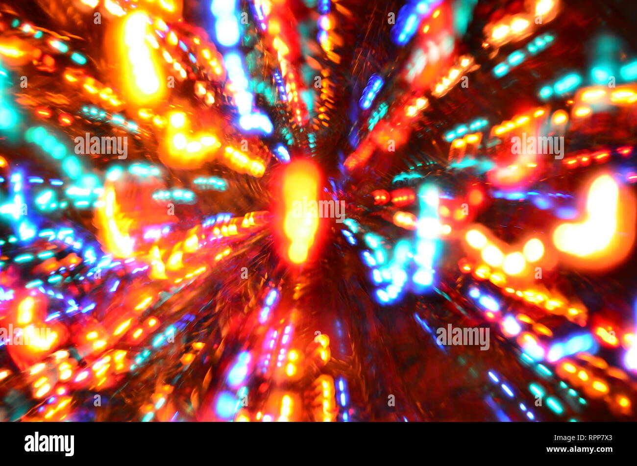 Multi-colored explosion of lights on dark background Stock Photo - Alamy