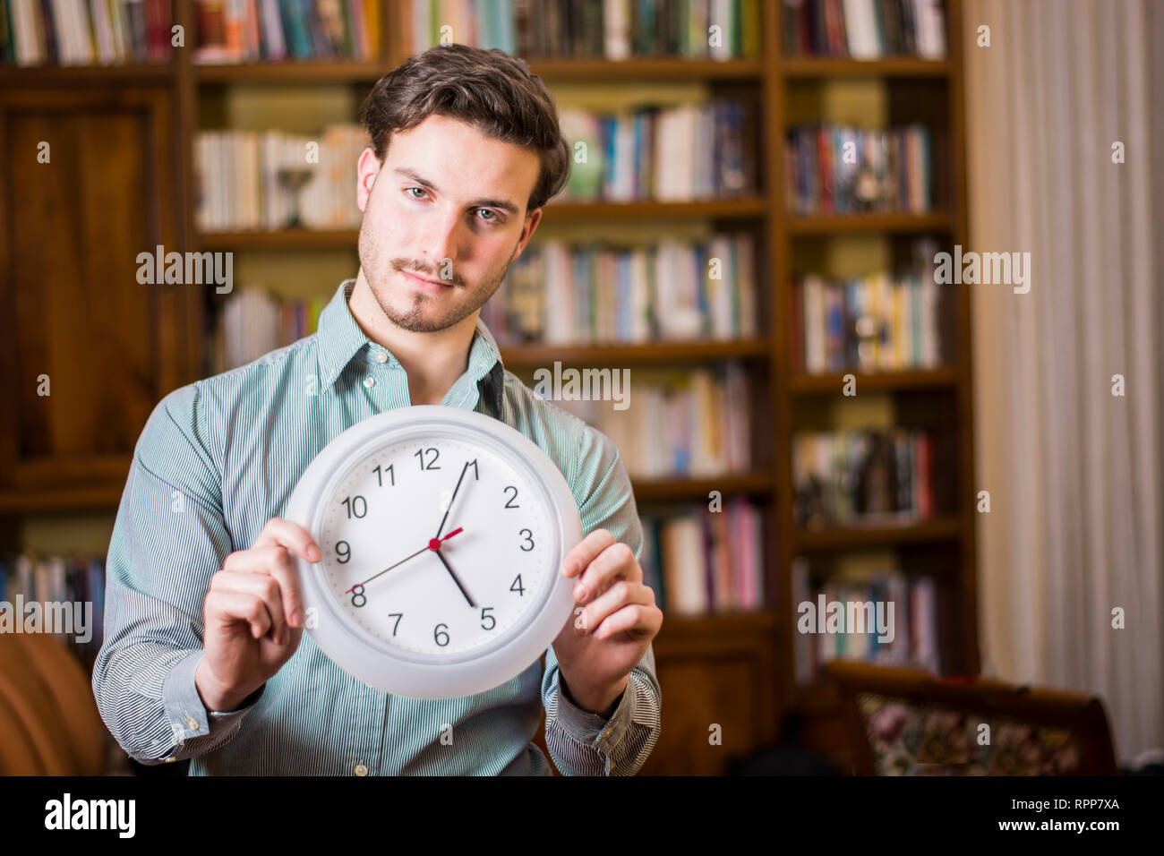 Man clock hi-res stock photography and images - Alamy