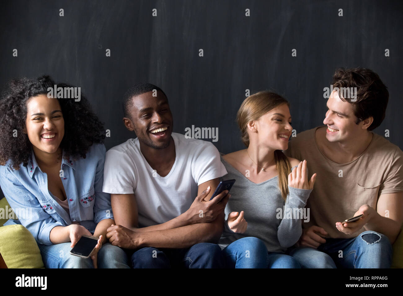 Holding phones hi-res stock photography and images - Alamy
