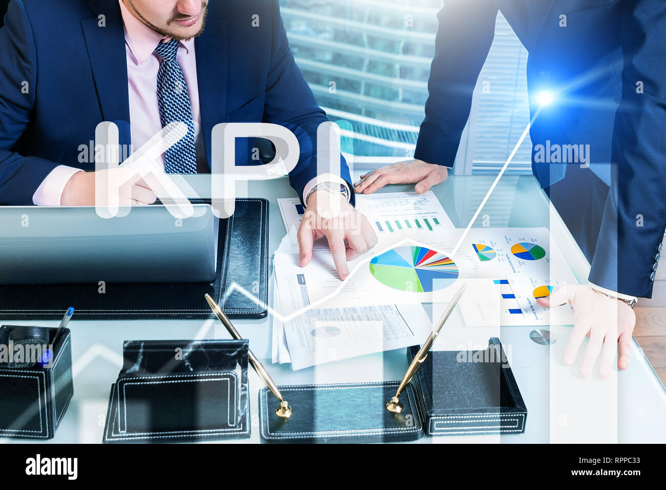 KPI - Key performance indicator graph on blurred background Stock Photo ...