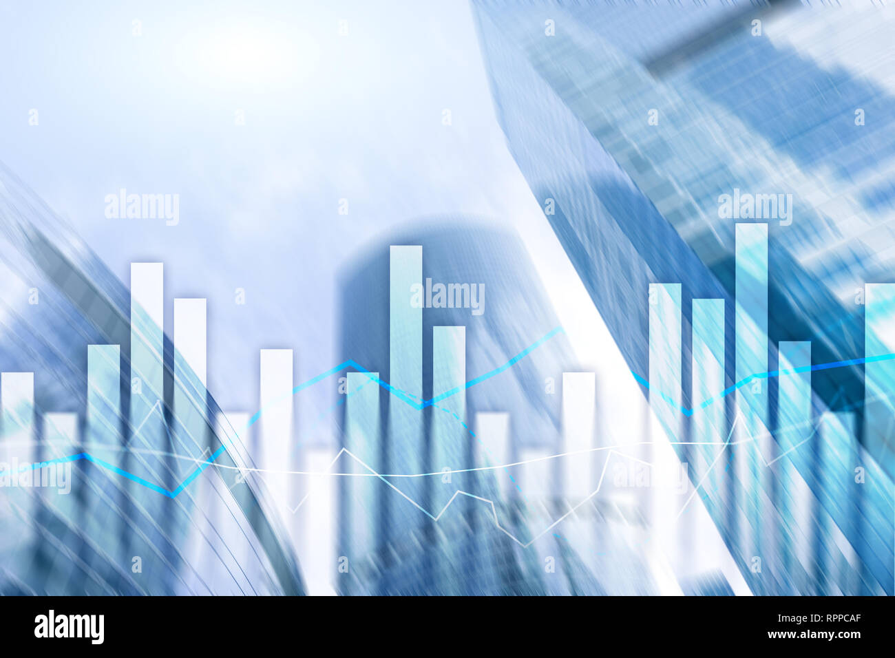 Financial graphs and charts on blurred business center background ...