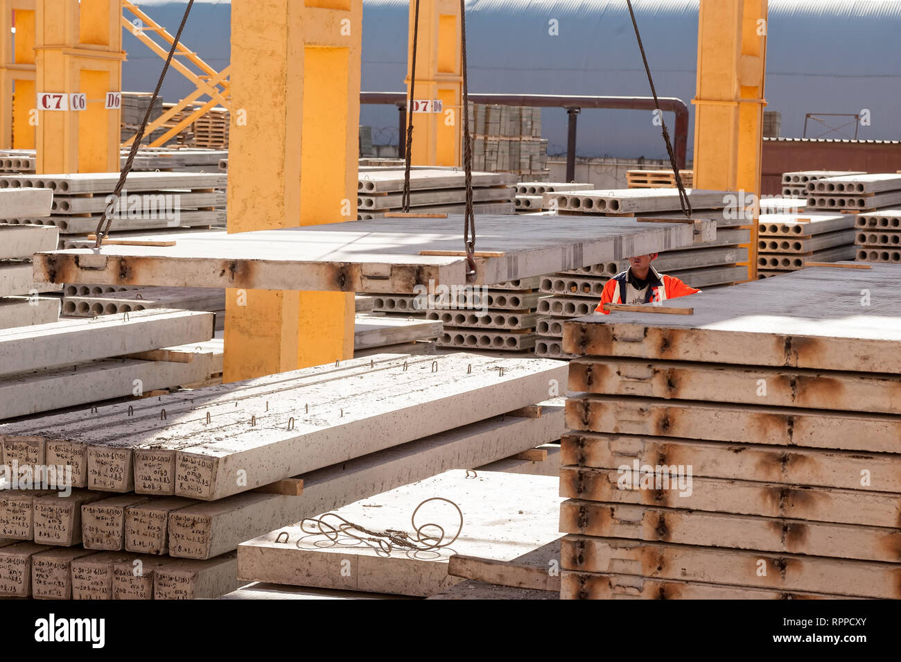 Worker builder manages construction process Stock Photo - Alamy