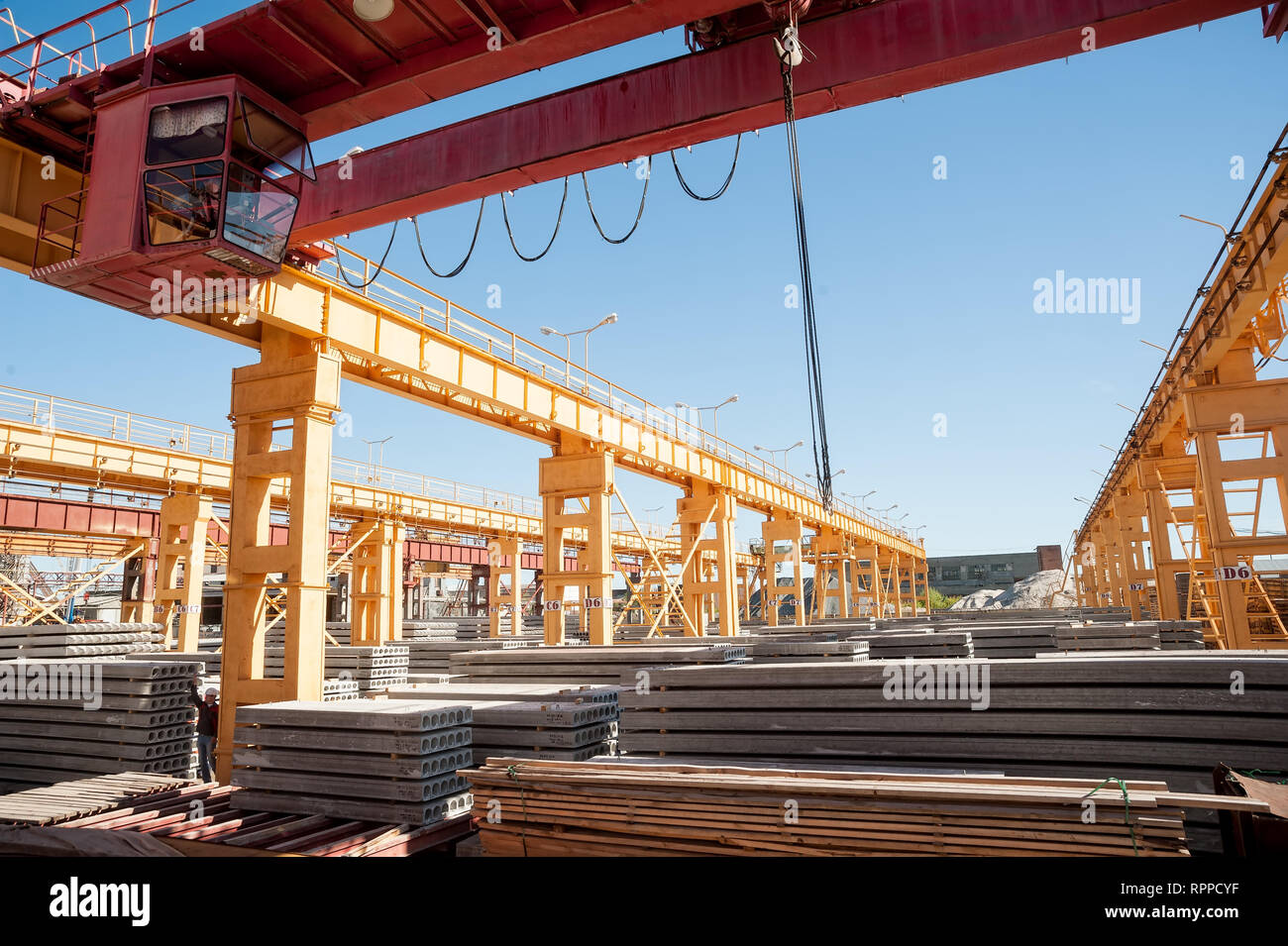 Loading concrete products in truck Stock Photo - Alamy