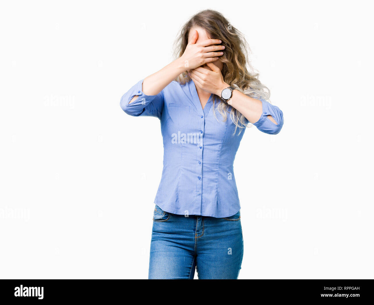 Beautiful young blonde business woman over isolated background Covering ... Beautiful young blonde business woman over isolated background Covering ...