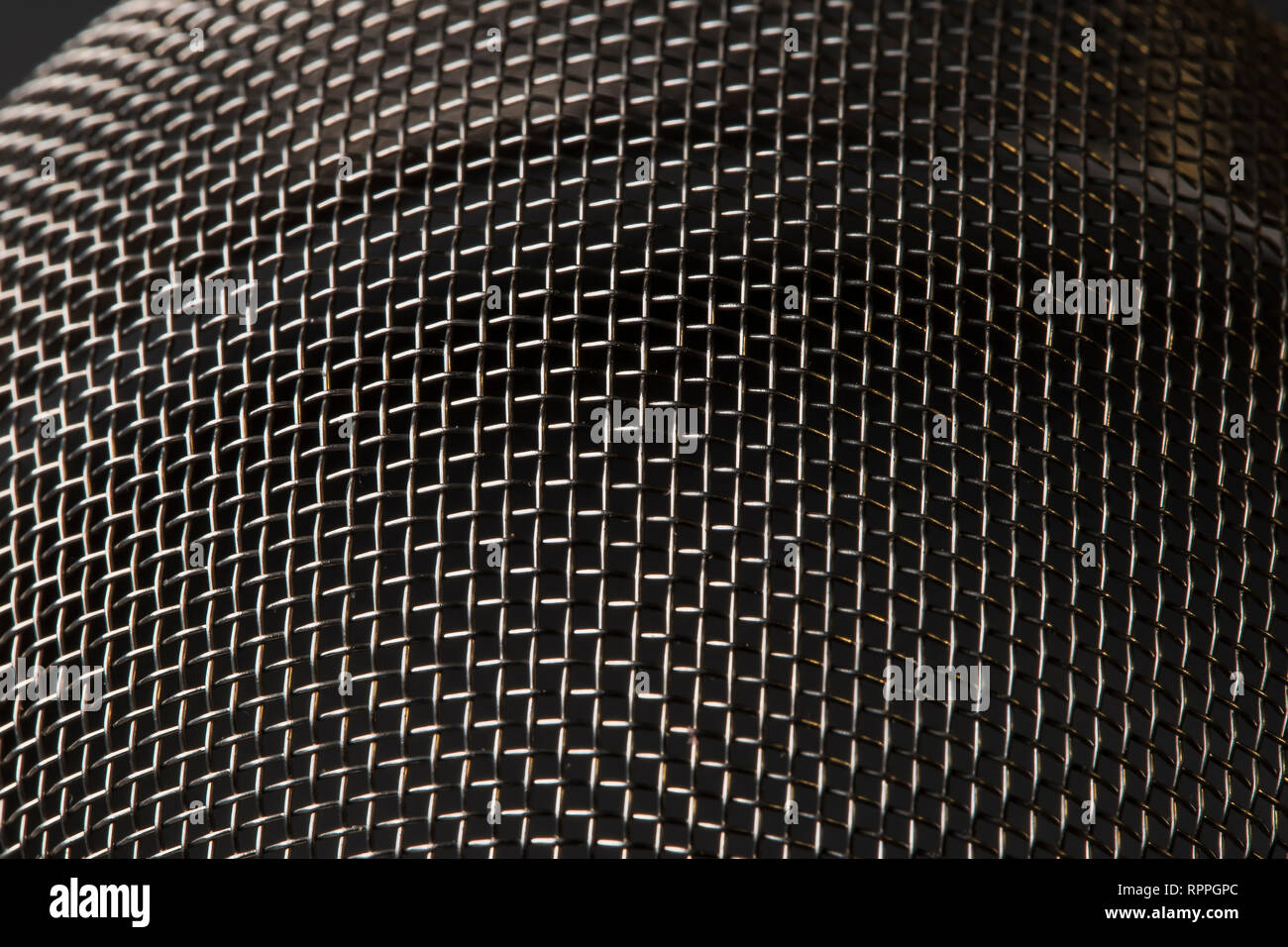 Metal surface with holes, industrial background on black Stock Photo ...