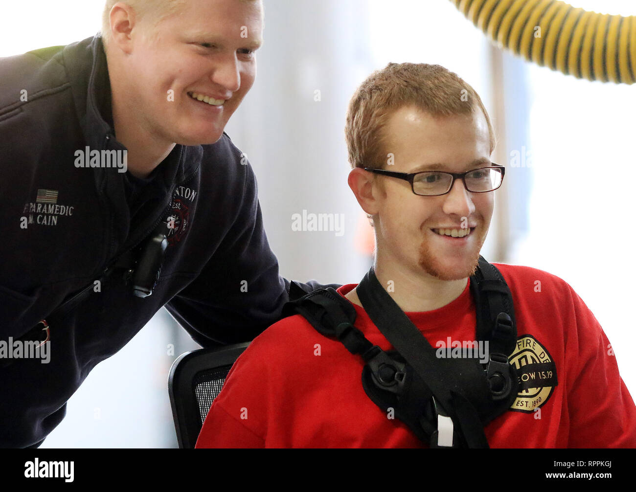 Clinton, Iowa, USA. 25th Jan, 2019. Matt Cain, left poses for a picture ...