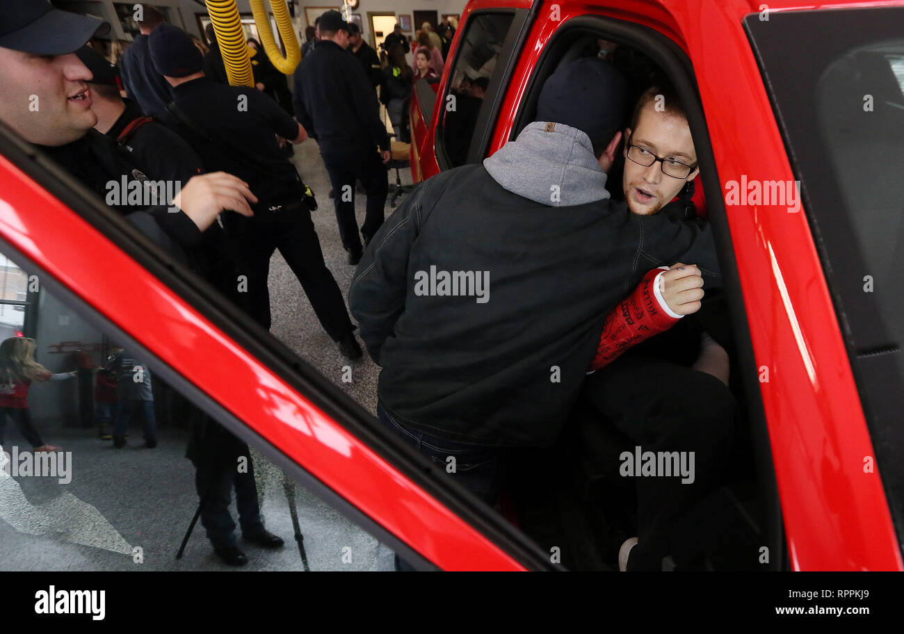 Clinton, Iowa, USA. 25th Jan, 2019. Clinton Firefighter Adam Cain gets ...