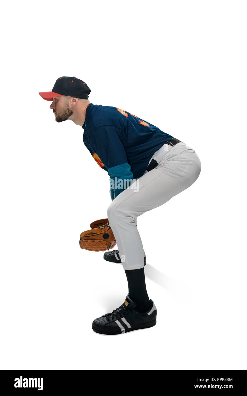 Baseball player pitching a ball Stock Photo - Alamy