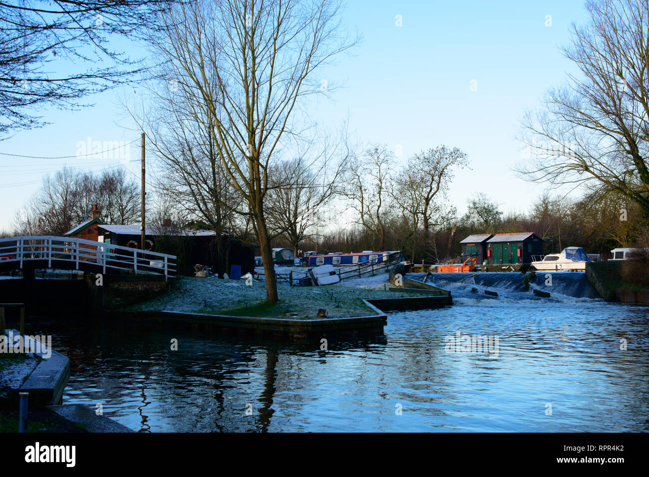 Dawn rises on a winter's morning at Paper Mill Lock, on the Chelmer and ...