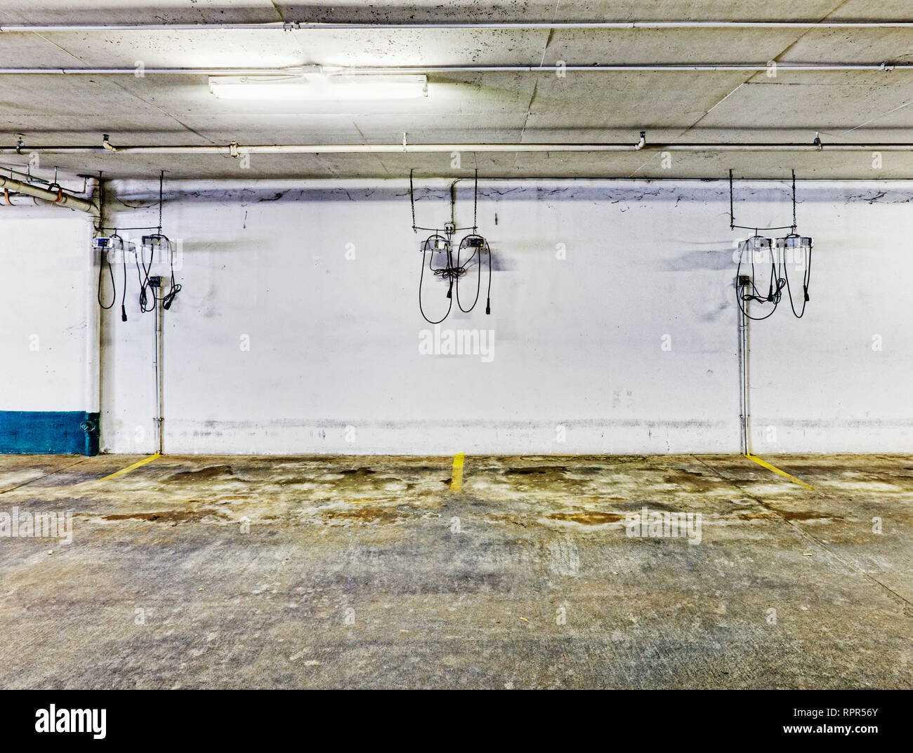 Parking Garage With Charging Stalls Stock Photo - Alamy