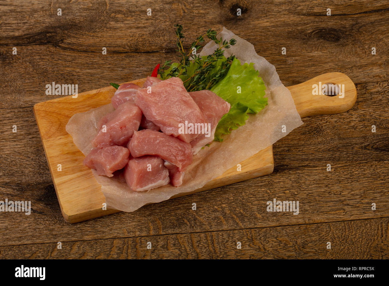 Raw pork meat heap for roast Stock Photo - Alamy