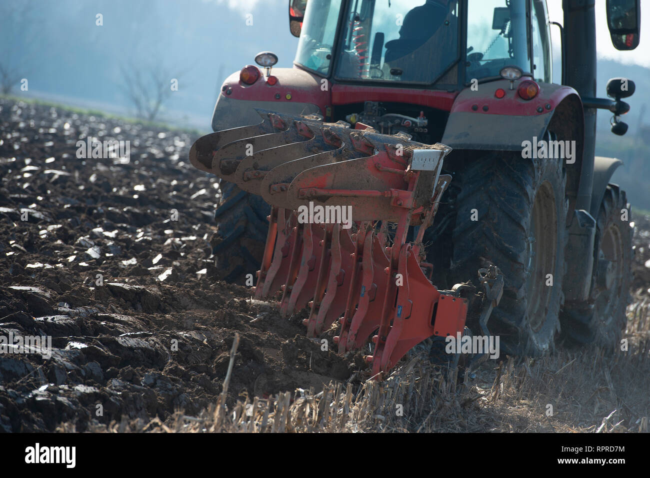Tractor plowing fields in hi-res stock photography and images - Alamy
