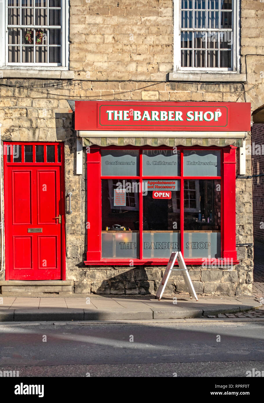 English village shop front, The Barber Shop in Market Place, Tickhill ...