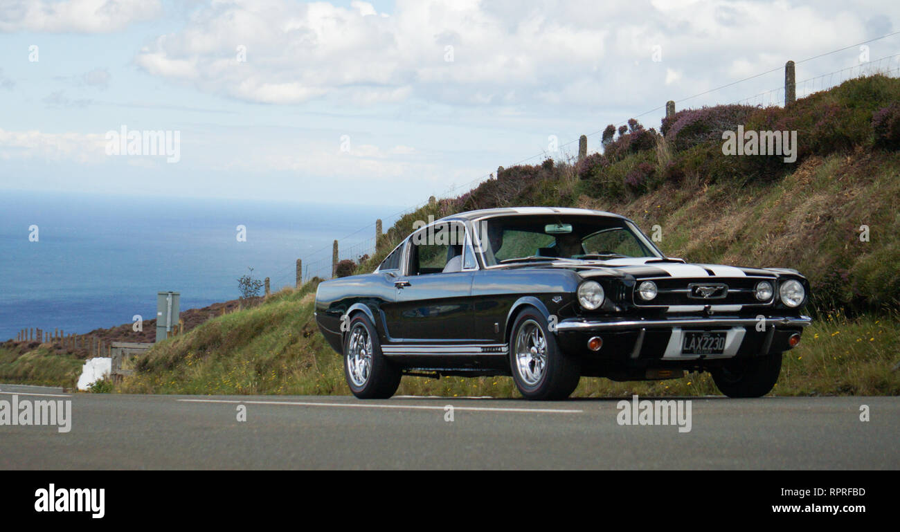 classic mustang car on the famous TT course isle of man Stock Photo - Alamy