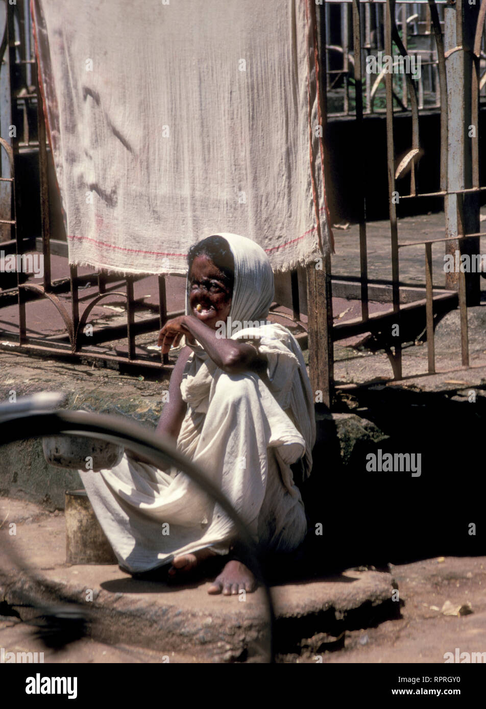 A woman leper outcast forced to beg on the street India Stock Photo - Alamy