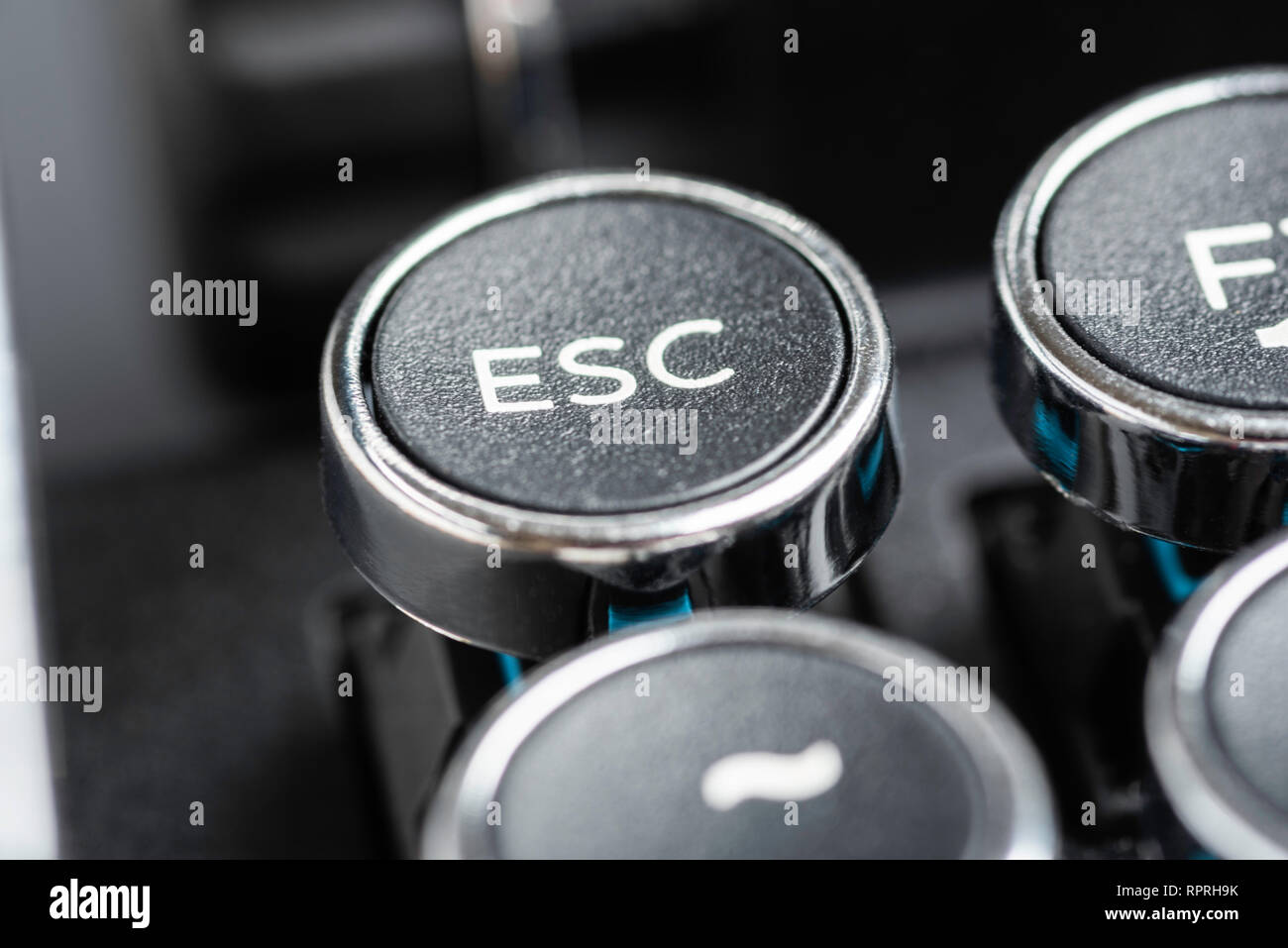 An extreme close-up or a macro shot of black circular metal keyboard ...