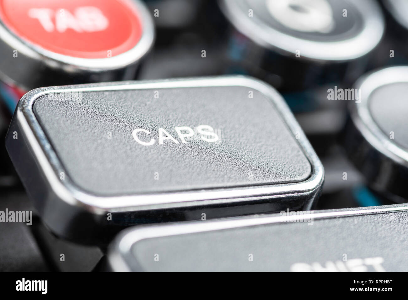 An extreme close-up or a macro shot of black circular metal keyboard ...