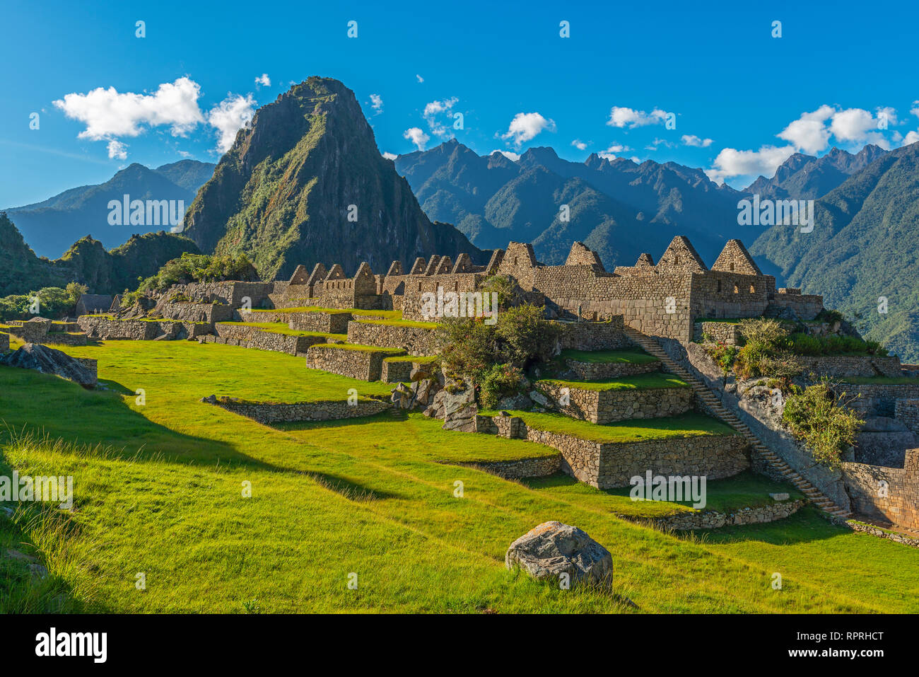 The main square of the Machu Picchu inca ruin with the Huayna Picchu ...