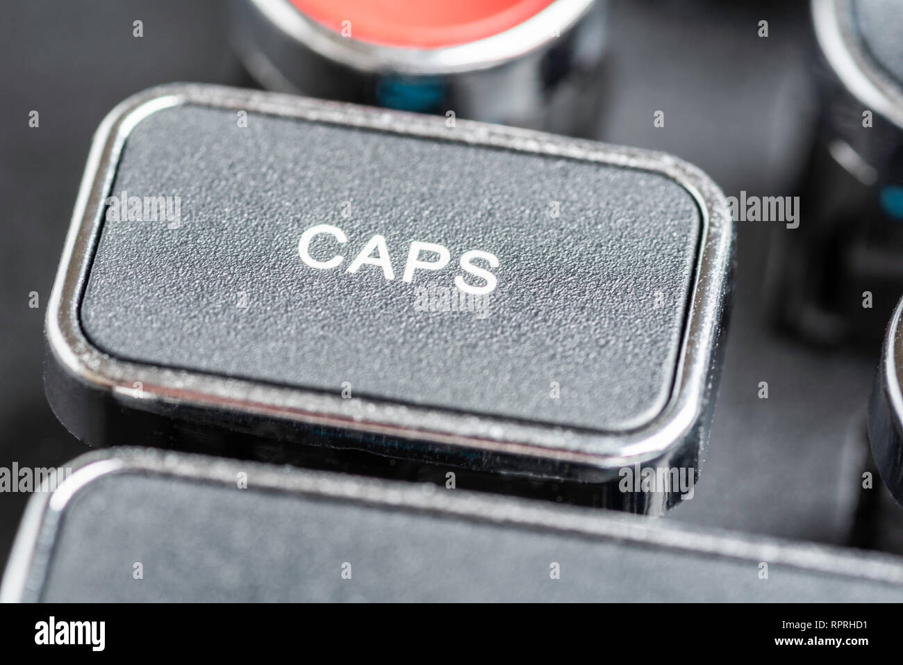 An extreme close-up or a macro shot of black circular metal keyboard ...
