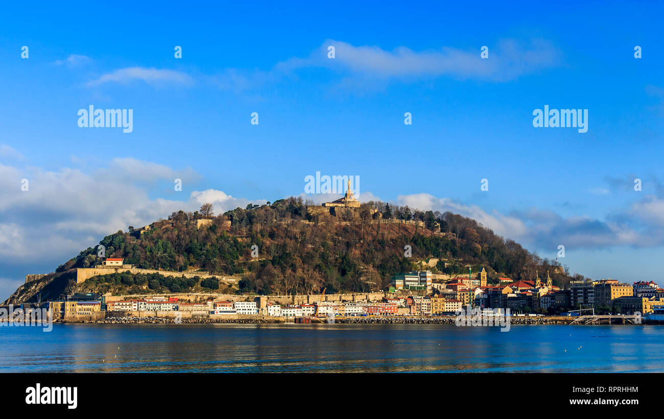 Landscape view of the Old Town and mount Urgull in San Sebastian, Spain ...