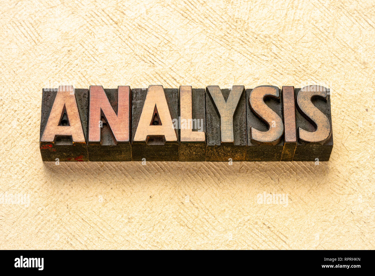 analysis word in vintage letterpress wood type blocks against textured ...
