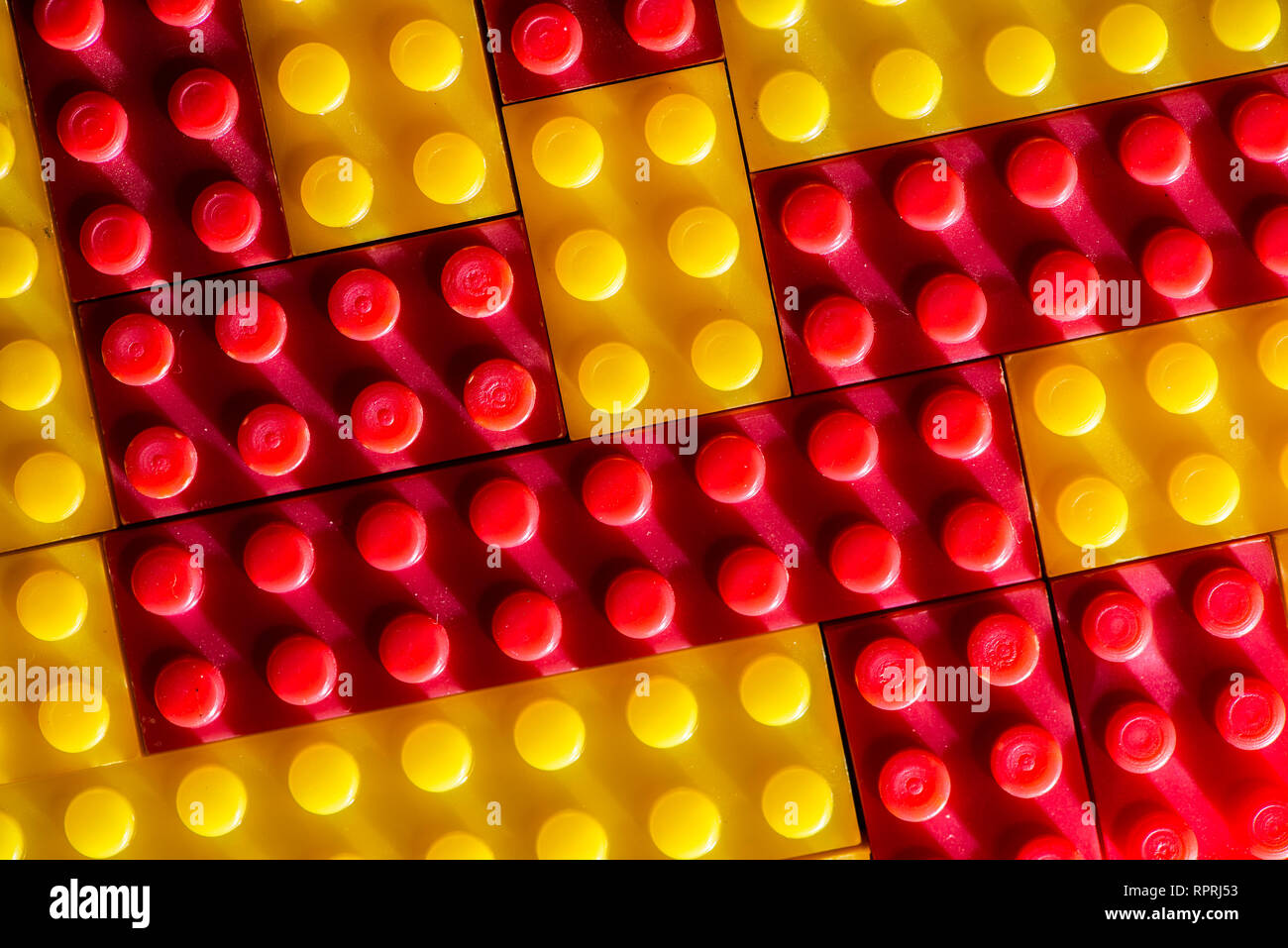 Plastic geometric cubes. Construction toy solid background from ...