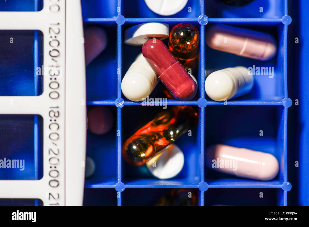 Pills in box with dates. Different medicines separated per dates and ...