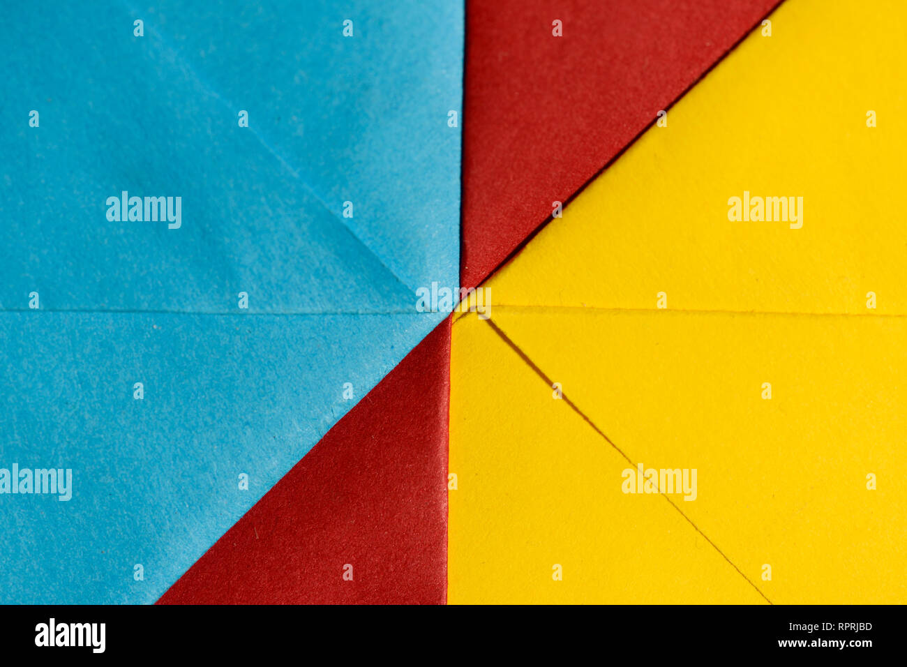 Abstract geometric paper shapes. Pastel tones crumpled paper. Hard ...