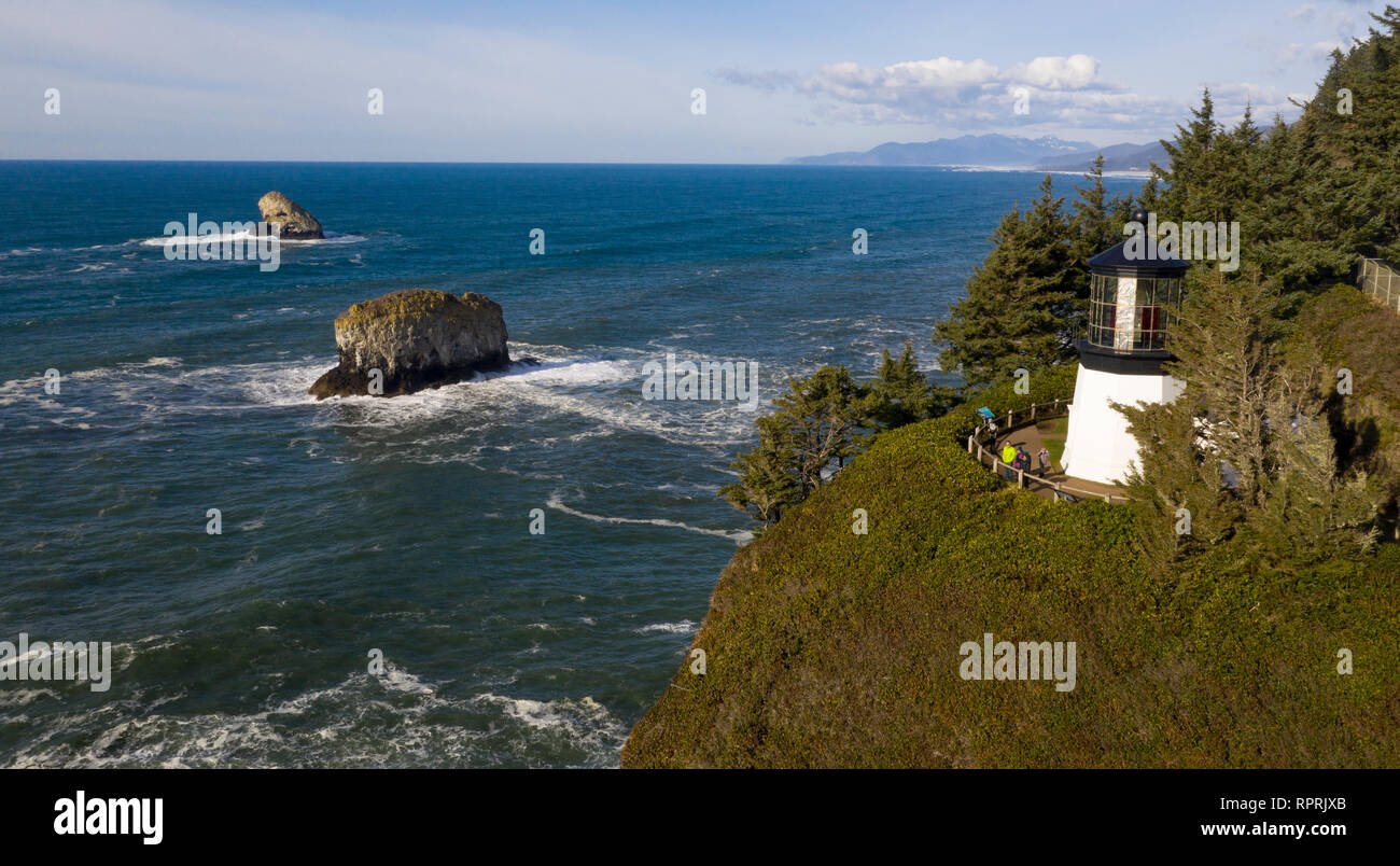 Pacific Ocean waves crash against high bluffs below Cape Meares ...