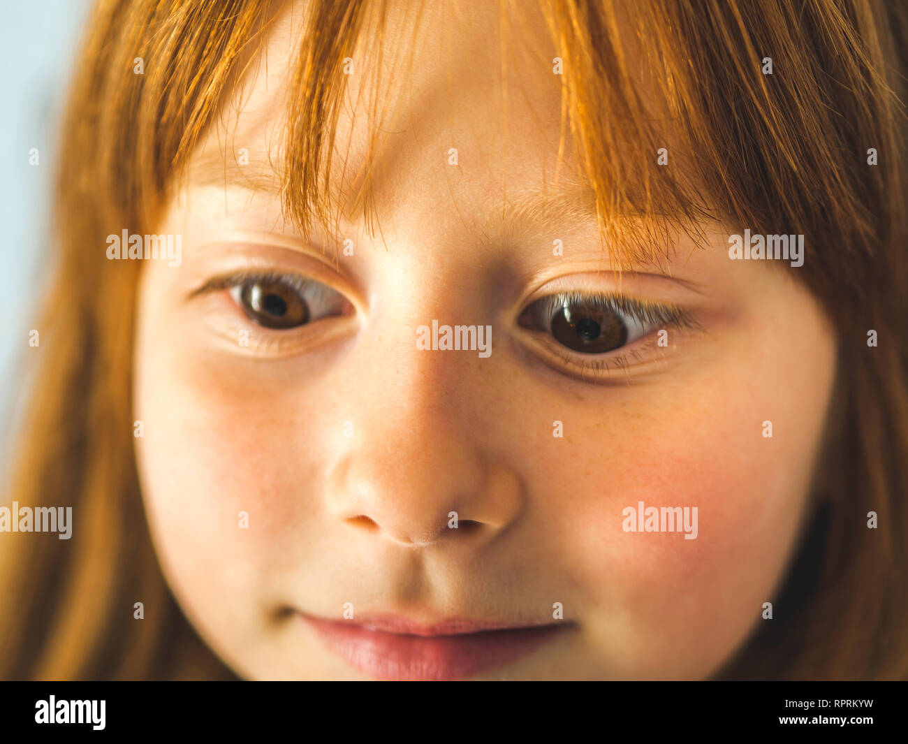 Cute redhead little girl. Funny expression. Vivid eyes and cheerful ...