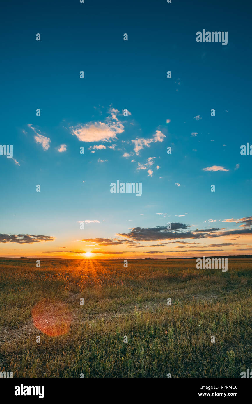 Summer Sunset Sunrise Sky Above Countryside Rural Meadow Landscape. Sun ...