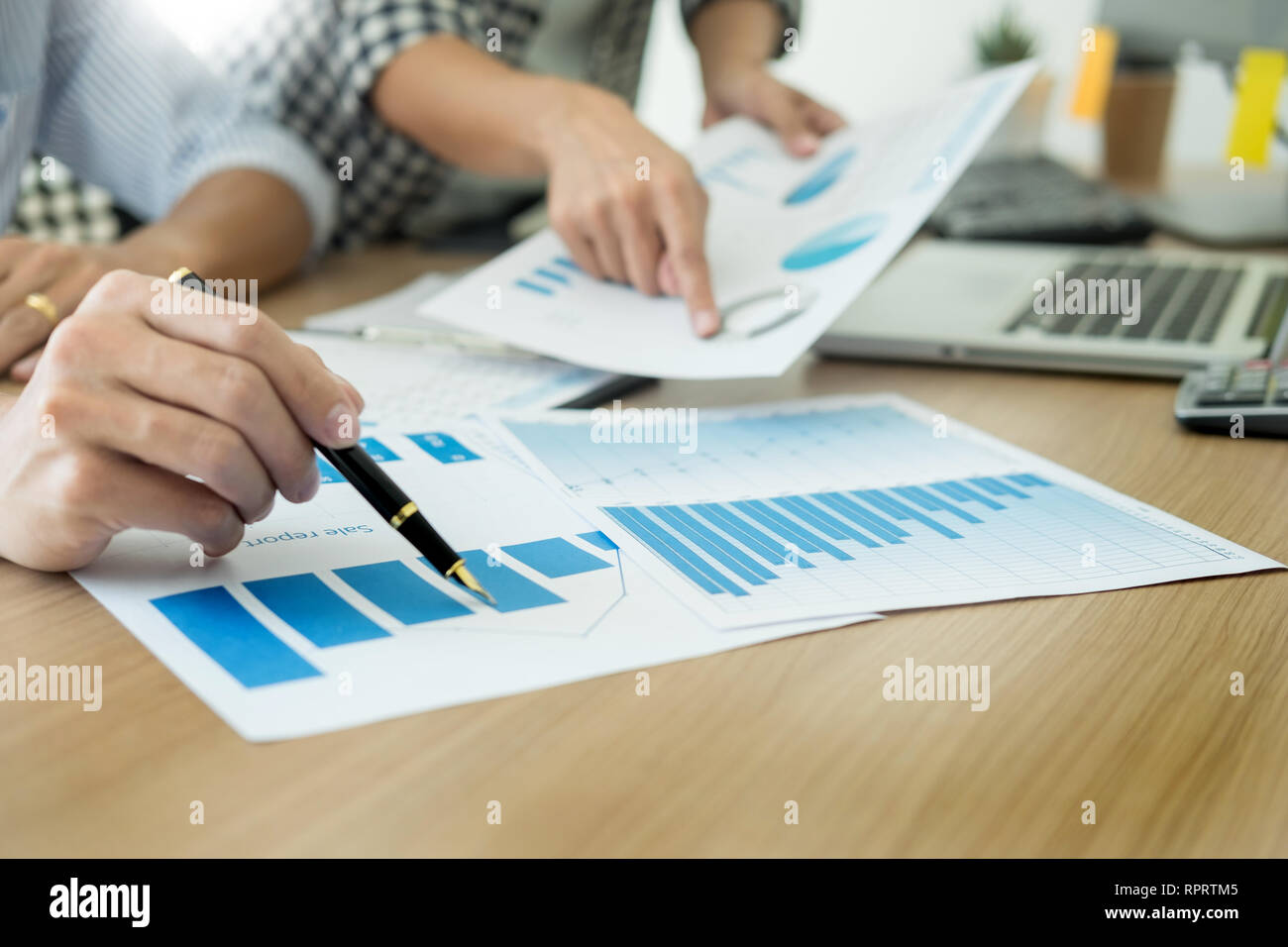 Business people working analysis graph on desk at meeting room ...