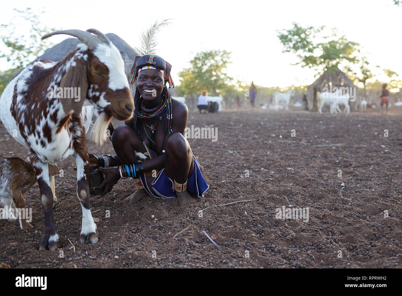 Zemba people in their morning routine in a village near Epupa, Namibia ...