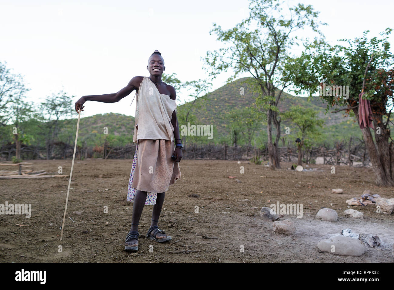 Himba boy herder with a strick, Namibia, Africa Stock Photo - Alamy