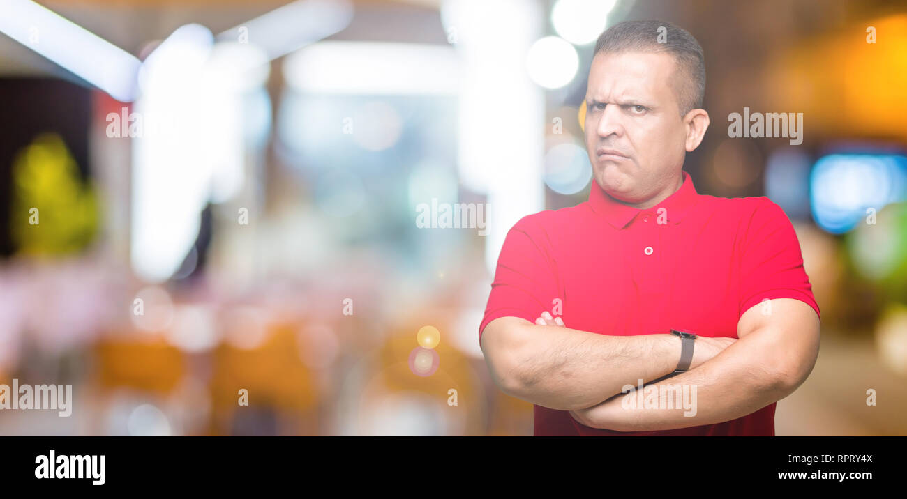 Middle age arab man over isolated background skeptic and nervous ...