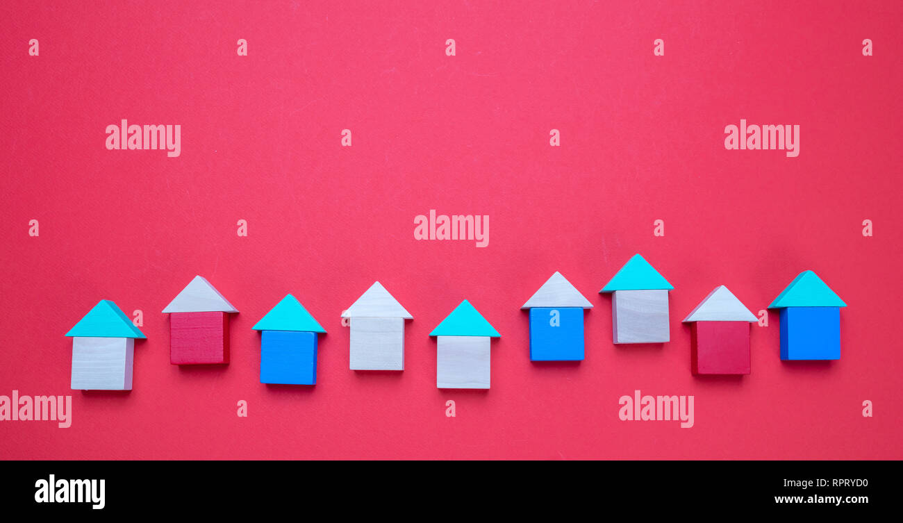 Real estate and village concept, Small wooden blocks house models with ...