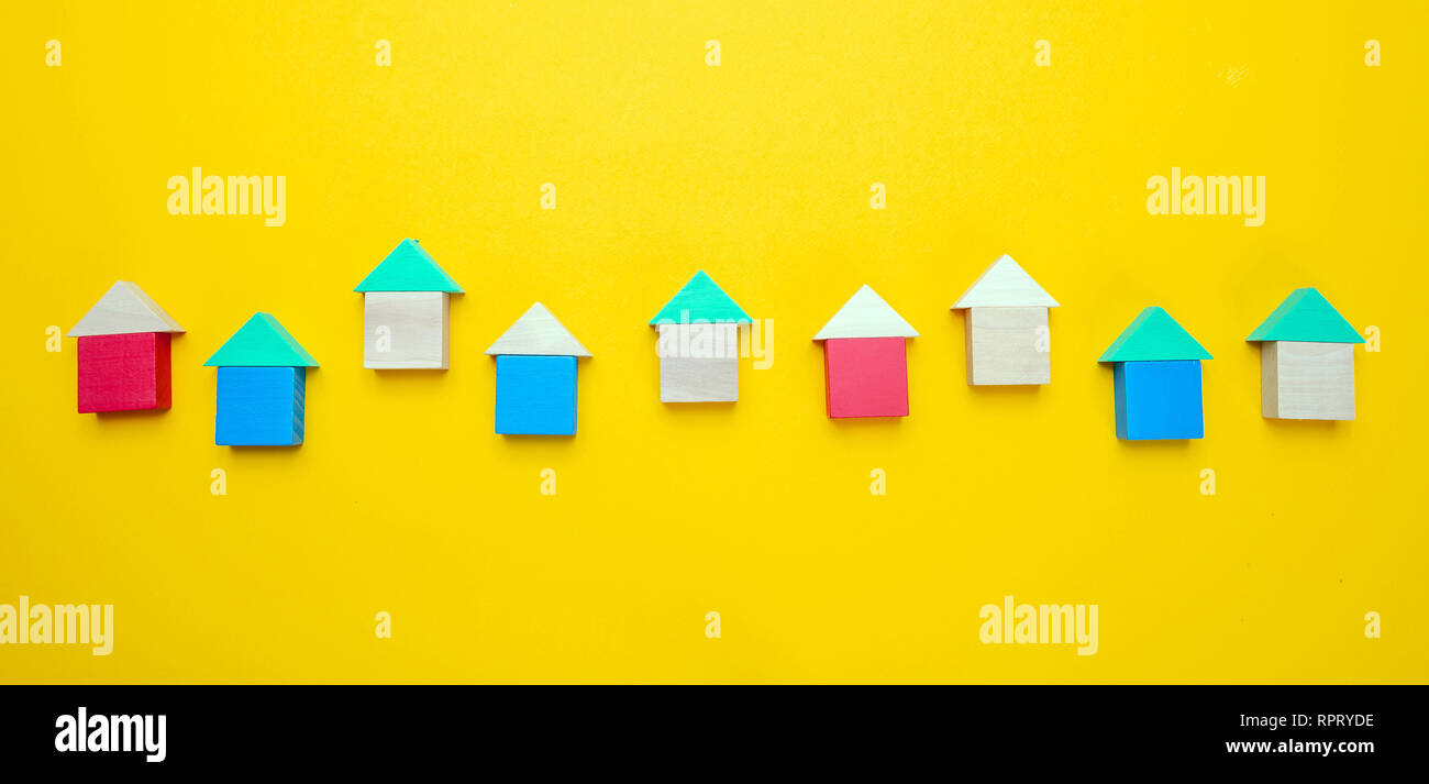 Real estate and village concept, Small wooden blocks house models with ...