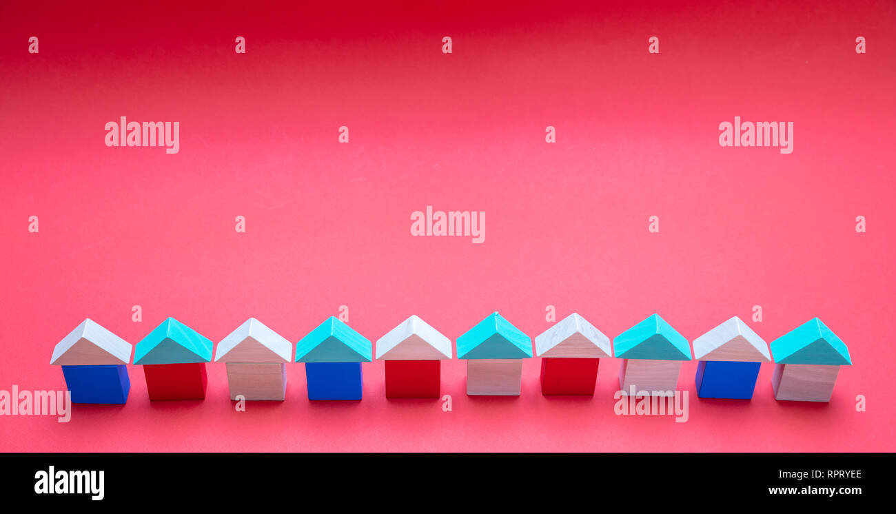 Real estate and village concept, Small wooden blocks house models with ...